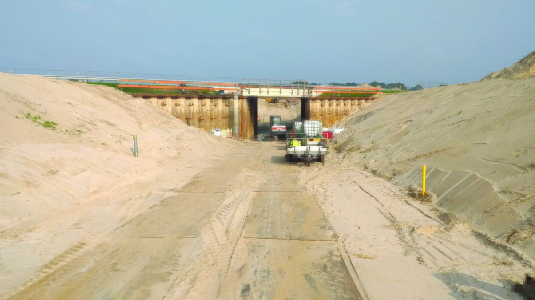Motorway underpass using geomembranes as a groundwater barrier ...